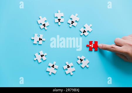 image of puzzle with people icons over wooden table ,human resources ...