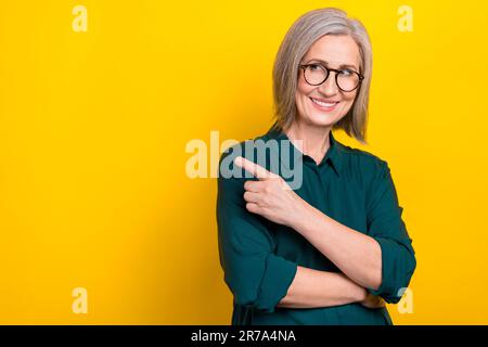 Photo of lady worker promoter point hands empty space adverts isolated ...