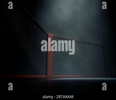 A dimly spotlit section of a mma octagon ring surrounded by wire mesh ...