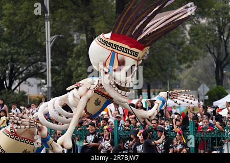 Giant skeletons process through the street during the Grand Parade of ...