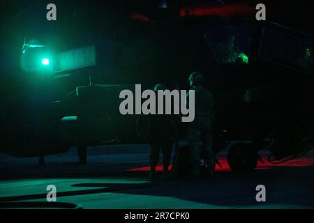 U.S. Air Force Airmen refuel an Apache AH-64 during Forward Air ...