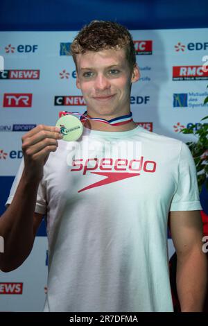 Winner Leon Marchand poses during the Swimming French National ...