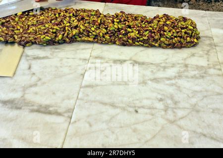 Torrone with pistachio and almond brittle from Sicily Stock Photo - Alamy
