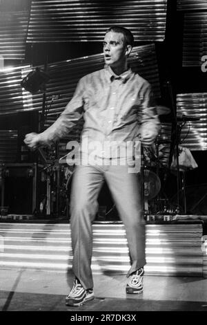 ROBBIE WILLIAMS, SINGER, FIRST TOUR, 1997: Robbie Williams playing live ...