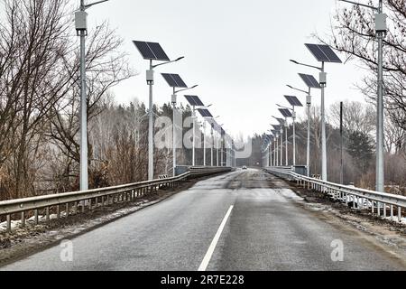 Lighting pole with photovoltaic panel and LED lamp lights with green ...