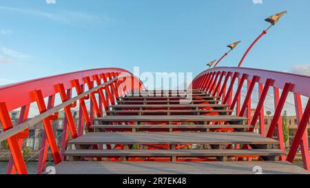 Python Bridge Stairs at Eastern Docklands in Amsterdam Stock Photo - Alamy