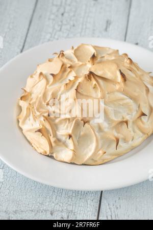 Baked Alaska dessert consisting of ice cream and browned meringue Stock ...