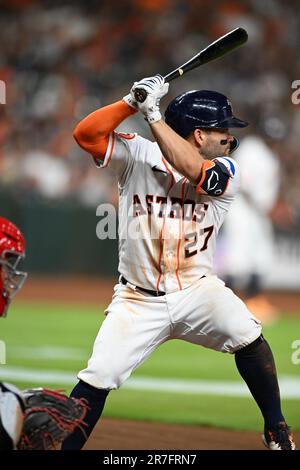 Houston Astros' Jose Altuve, left, and Christian Walker celebrate after a baseball game against ...