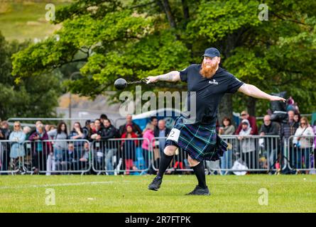 Male competittor in heavy ball and chain game event, Highland Games ...