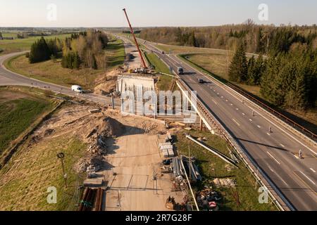 Drone photography of highway bridge being built during summer day. High ...