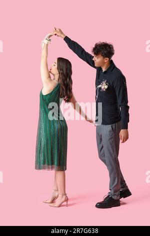 Beautiful couple dressed for prom dancing on white background Stock ...
