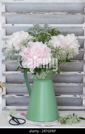 bouquet of pink peony flower and lamb´s ears in vintage vase Stock ...