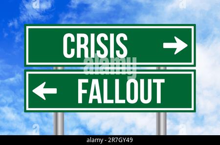Crisis or fallout road sign on blur background Stock Photo - Alamy