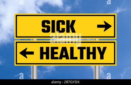 Sick or healthy road sign on cloudy sky background Stock Photo - Alamy