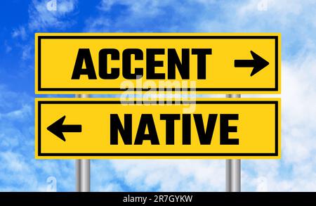 Accent or native road sign on blur background Stock Photo - Alamy