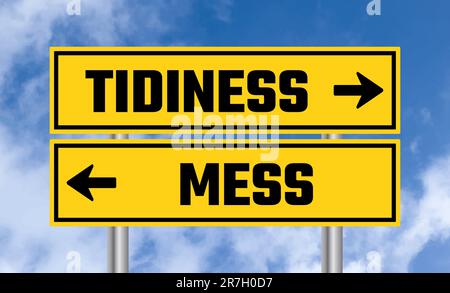 Tidiness or mess road sign on sky background Stock Photo - Alamy
