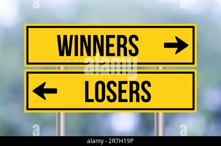 Winners road sign on blur background Stock Photo - Alamy