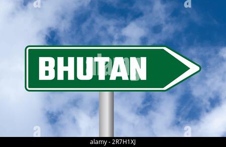 Bhutan road sign on sky background Stock Photo - Alamy