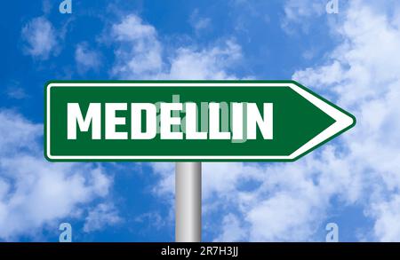 Medellin road sign on blue sky background Stock Photo - Alamy