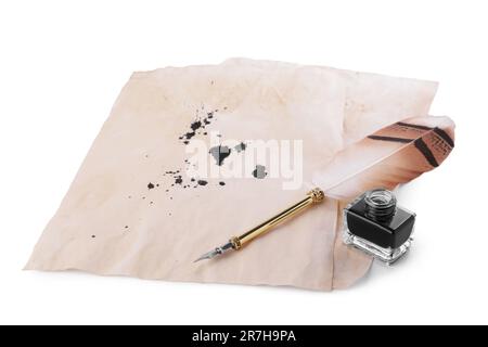 Parchment with stains of ink, feather pen and inkwell on white ...
