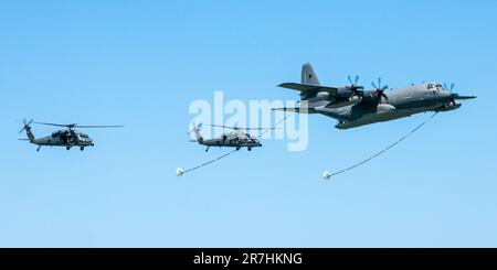 Helicopters refueling in the air Stock Photo - Alamy