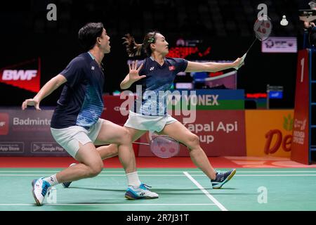 Hong Kong's Tang Chun Man, left, with Tse Ying Suet plays against Japan ...