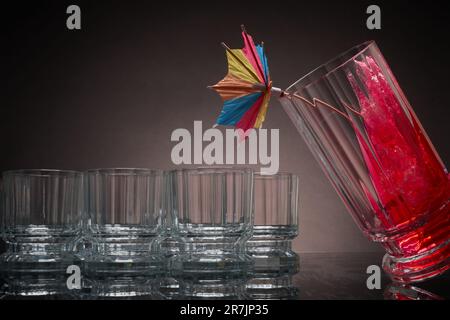 Sloshing, spilling drink with crushed ice Stock Photo - Alamy