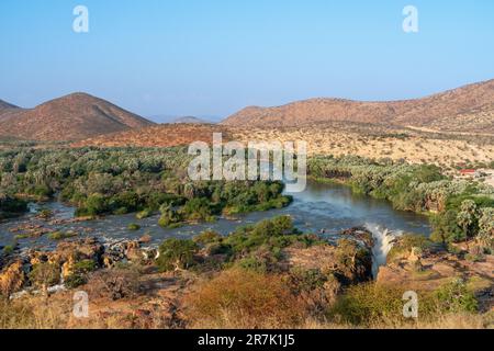 River rushing over jagged cliffs, Epupa falls Cunene River in Namibia ...