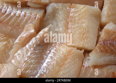 Raw fish fillet is spinning. Top view. Slices of fresh whitefish. Full ...
