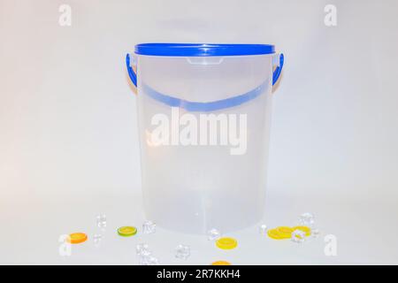 The Versatile Blue Plastic Cylinder Container with Lid is a practical ...