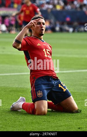 Yeremy Pino of Spain celebrates with team mates after scoring their ...