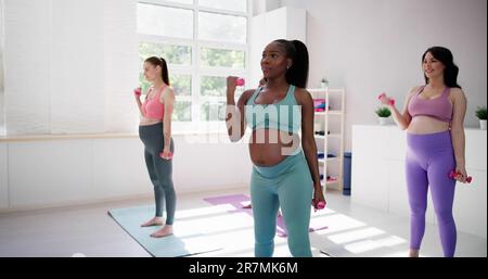 Diverse Pregnant Group Gym Fitness Exercise And Prenatal Training Stock ...