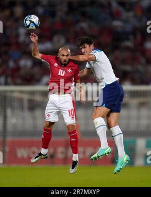 Malta's Teddy Teuma (left) and England's Trent Alexander-Arnold battle ...