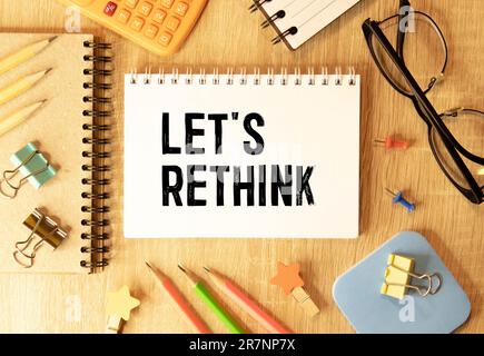 Let's Rethink text on notepad, concept background Stock Photo - Alamy