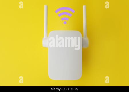 Modern repeater and Wi-Fi symbol on light blue background Stock Photo ...