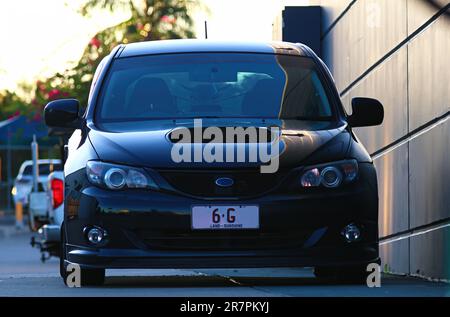 Random street photography of a black small car rear end, cropped to ...