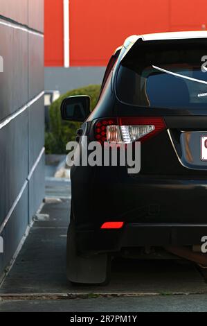 Random street photography of a black small car, front view, with nice ...