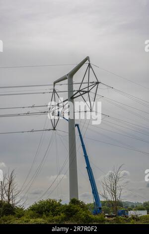 Pulling the power cables through snatch blocks Stock Photo - Alamy