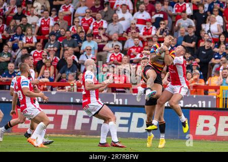 Ken Sio #2 of Salford Red Devils goes over for his second try of the ...