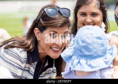 Republican presidential candidate Nikki Haley poses for a photo with ...