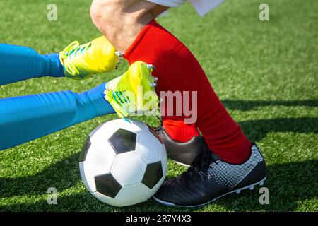 Symbol image of football: Player fouls his opponent after a rough ...