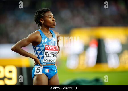 Ayomide Folorunso participating in the 400 meters hurdles at the World ...