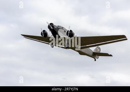 An old three-engine airliner in flight Stock Photo - Alamy