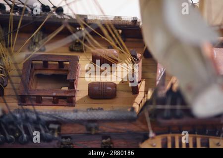 Antique gun ship with boats and sails, mock-up. Old objects of the 18th ...