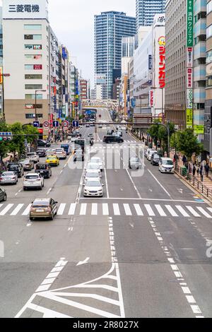 View along Route 176 in Umeda, Osaka. Typical urban scene with high ...