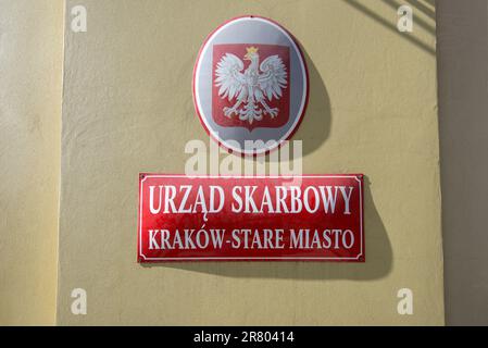 Urzad Skarbowy (Polish Tax Office) logo displayed on smartphone hidden ...