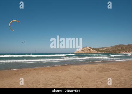 Different wake boarders surfing in the sea at the Prasonisi Beach at ...
