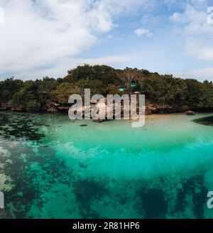Waikuri Sumba lagoon in Indonesia, surrounded with rock cliff and ...