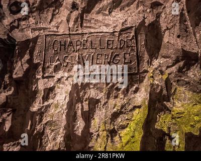 The image is of direction signs at the medieval underground city museum ...