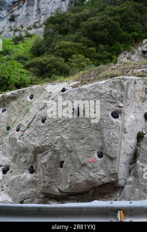 Road construstion works, dynamite hols for blasting of rock in ...